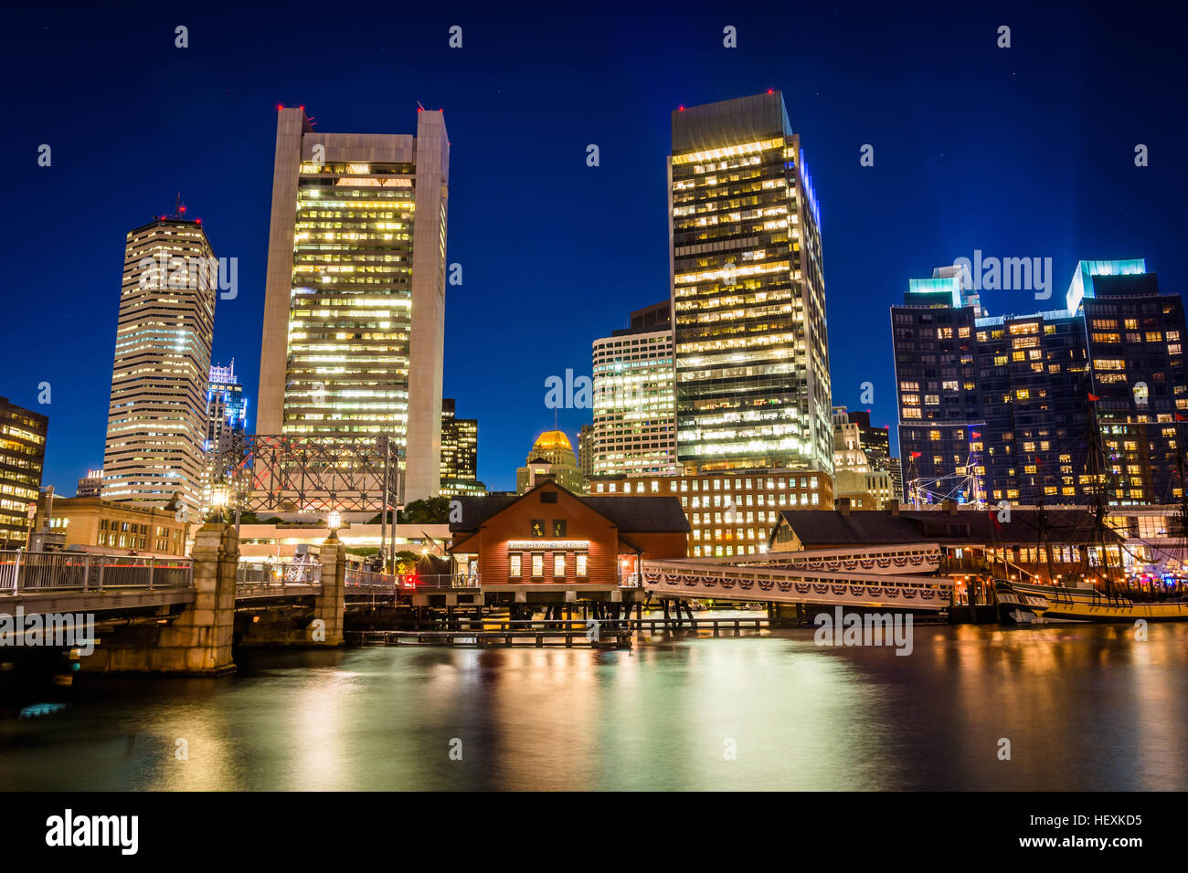 The Boston skyline and Fort Point Channel at night, in Boston ...