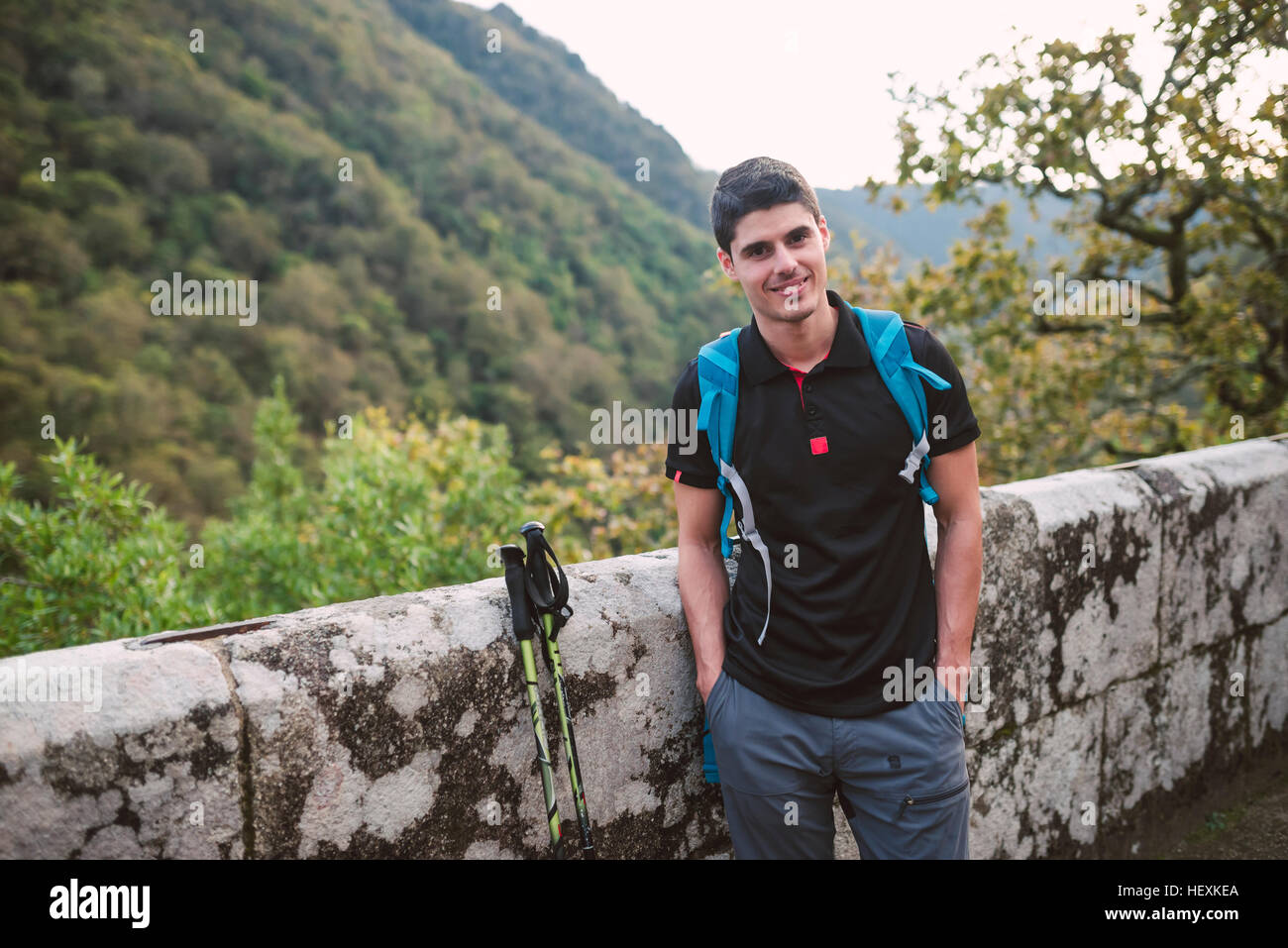 Portrait of a smiling hiker Stock Photo - Alamy