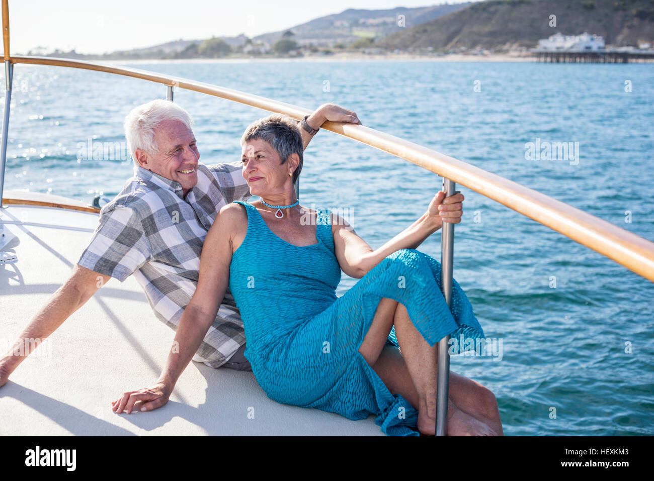 Happy couple on a boat trip Stock Photo - Alamy