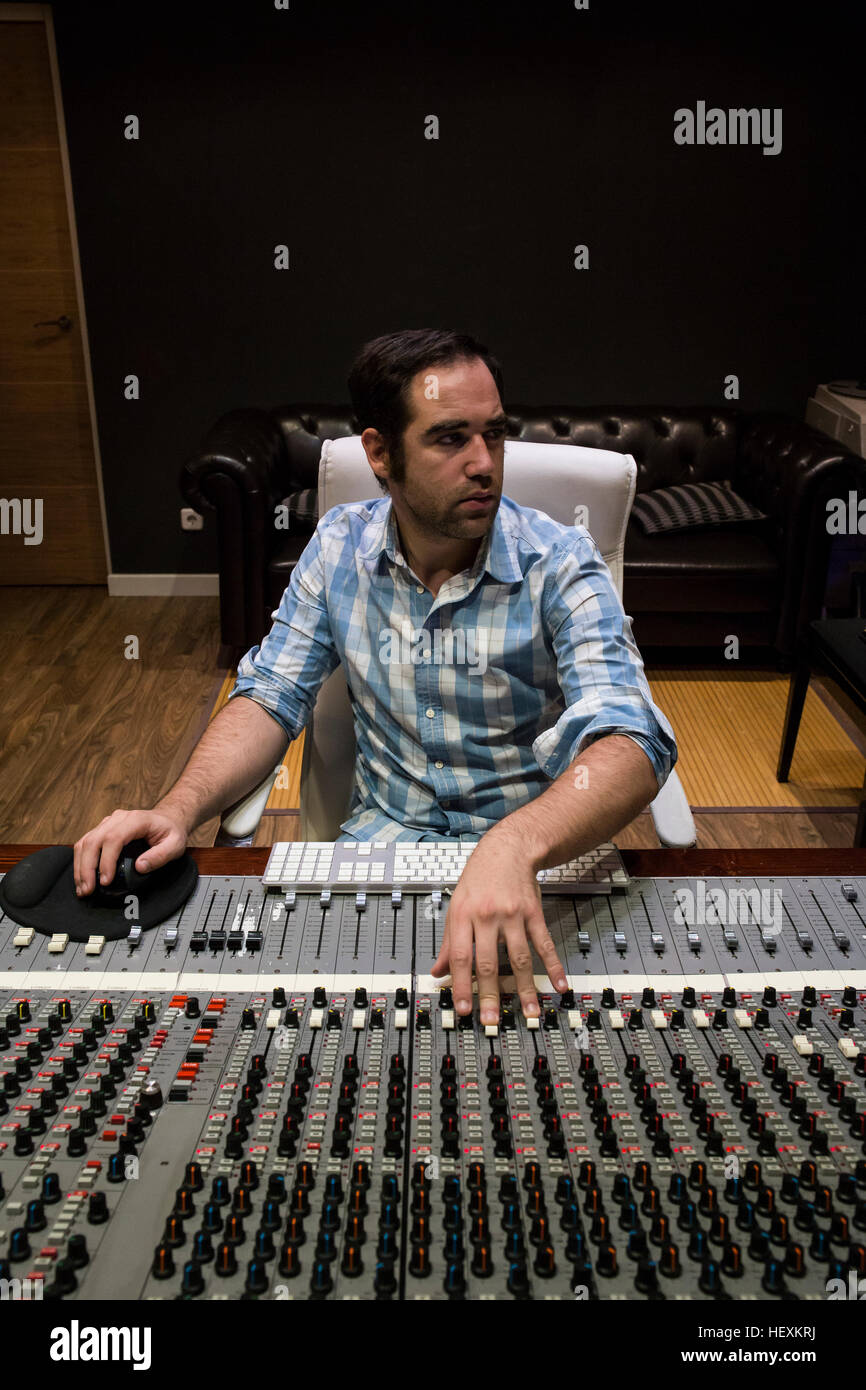 Man working in the control room of a recording studio Stock Photo - Alamy