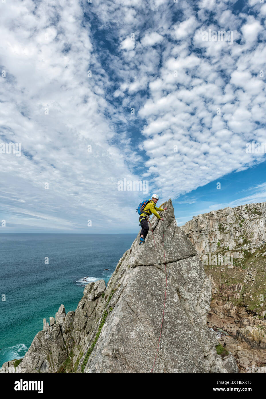 UK, Cornwall, woman on peak of Commando Ridge climbing route Stock ...
