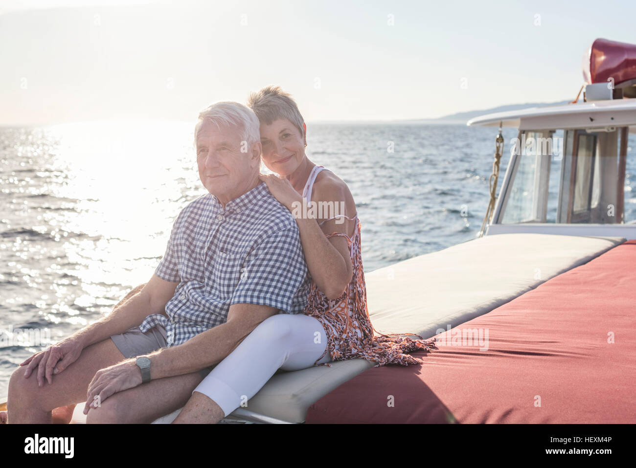 Affectionate couple on a boat trip Stock Photo - Alamy