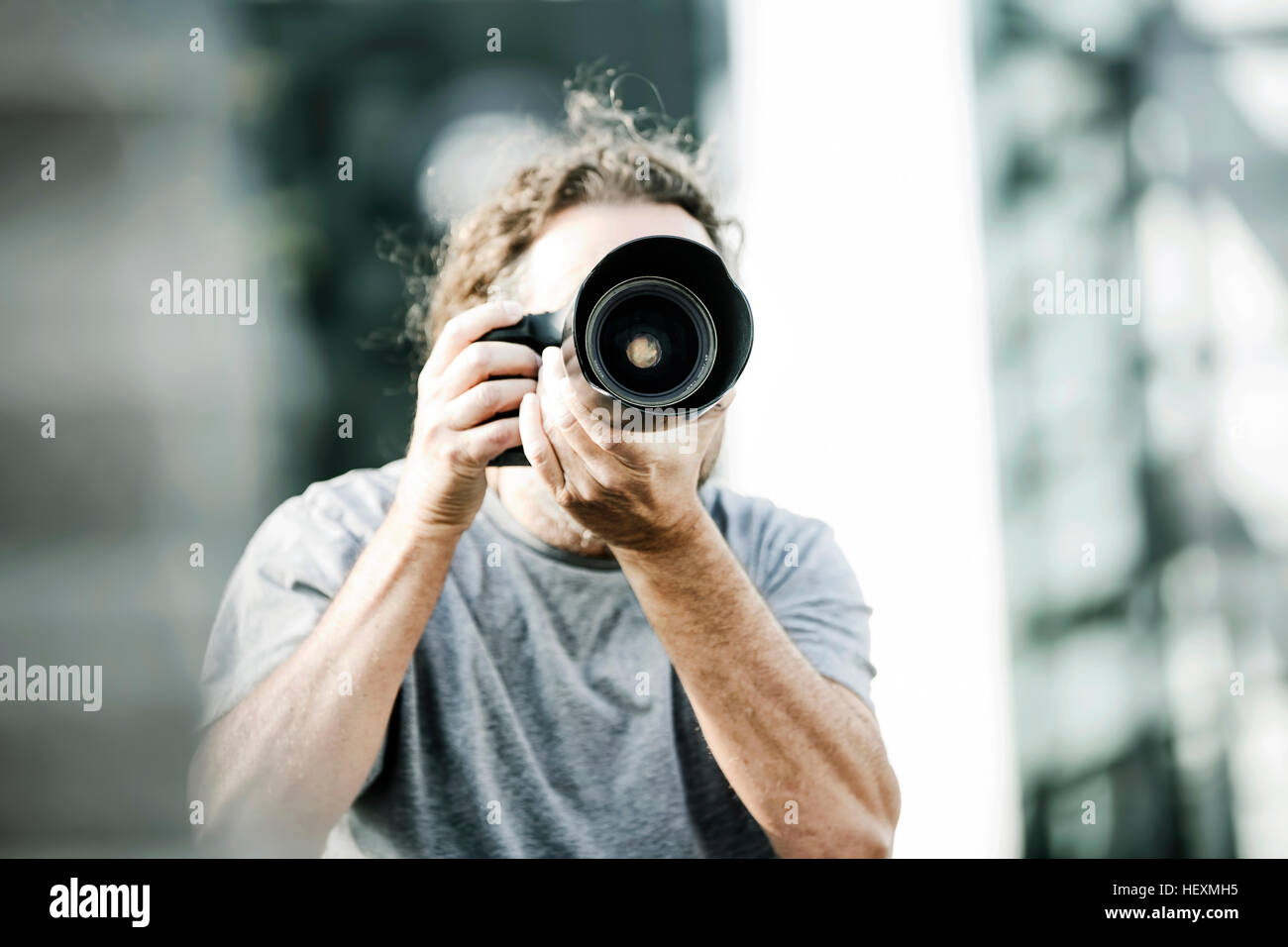 Man pictures with camera Stock Photo - Alamy