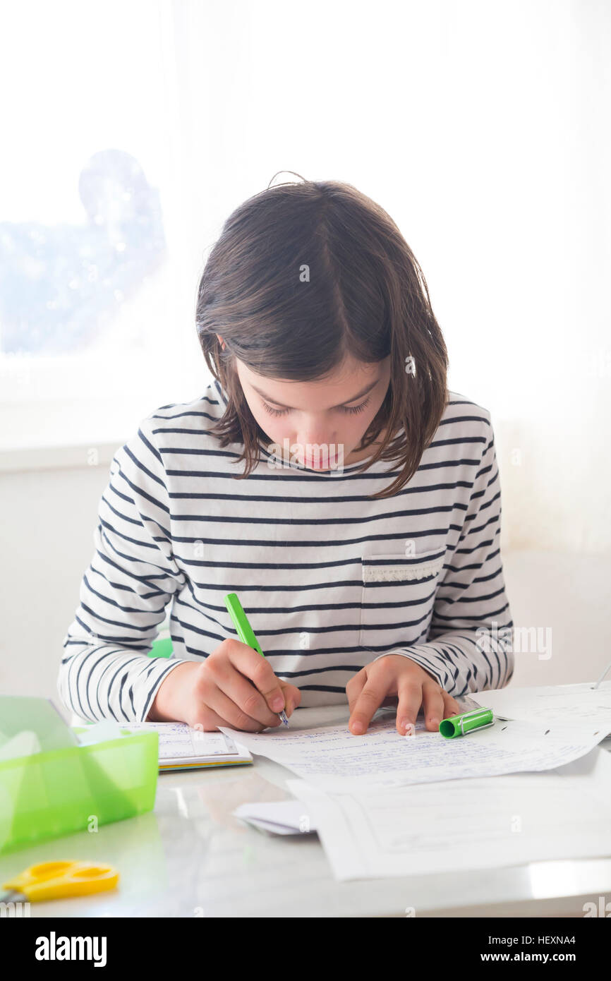 Girl doing homework Stock Photo - Alamy