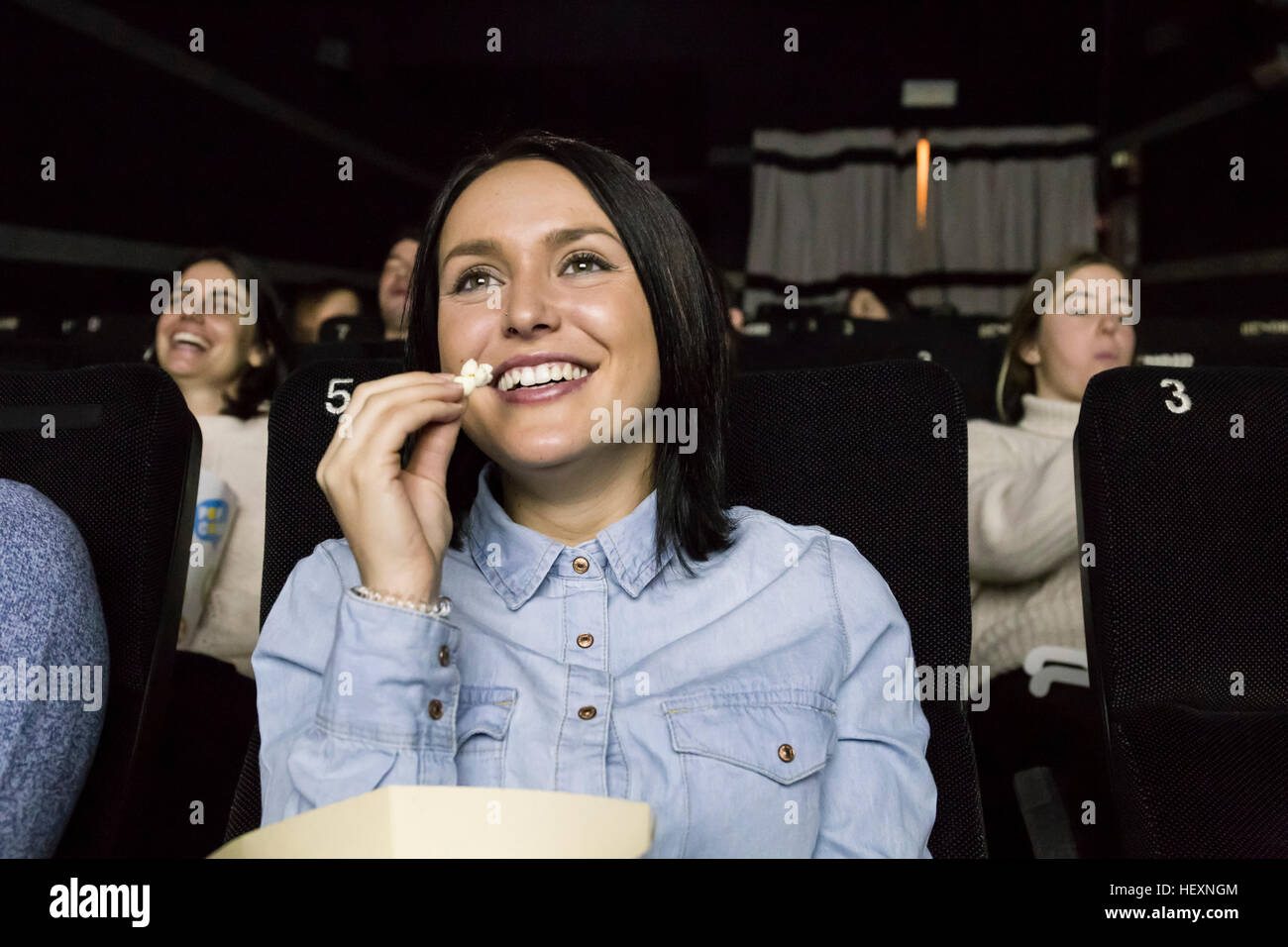 Woman in the cinema hi-res stock photography and images - Alamy