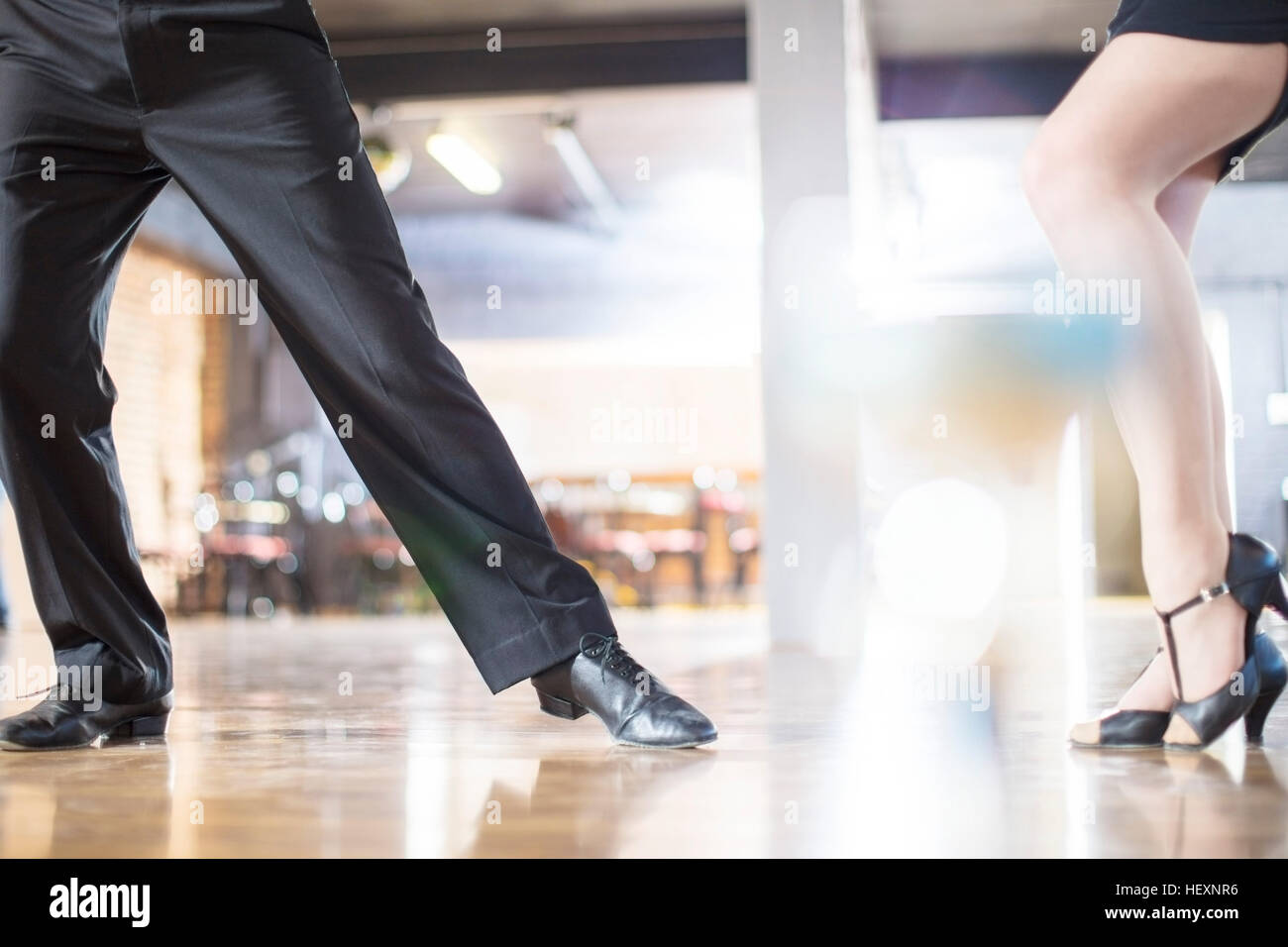 Legs of dancing couple in studio Stock Photo - Alamy