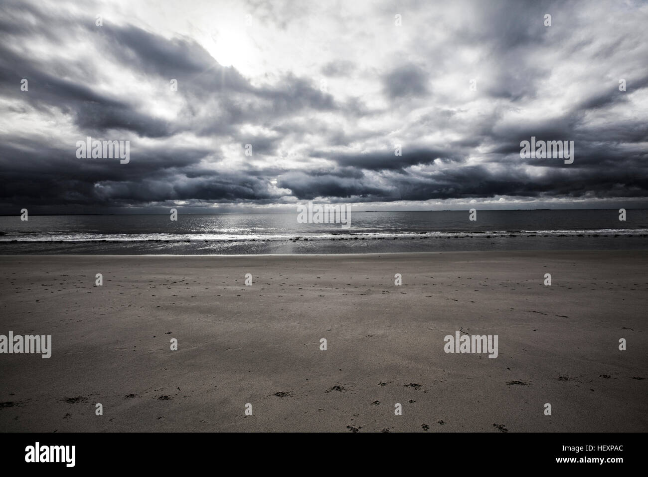France, sandy beach on cloudy day Stock Photo - Alamy