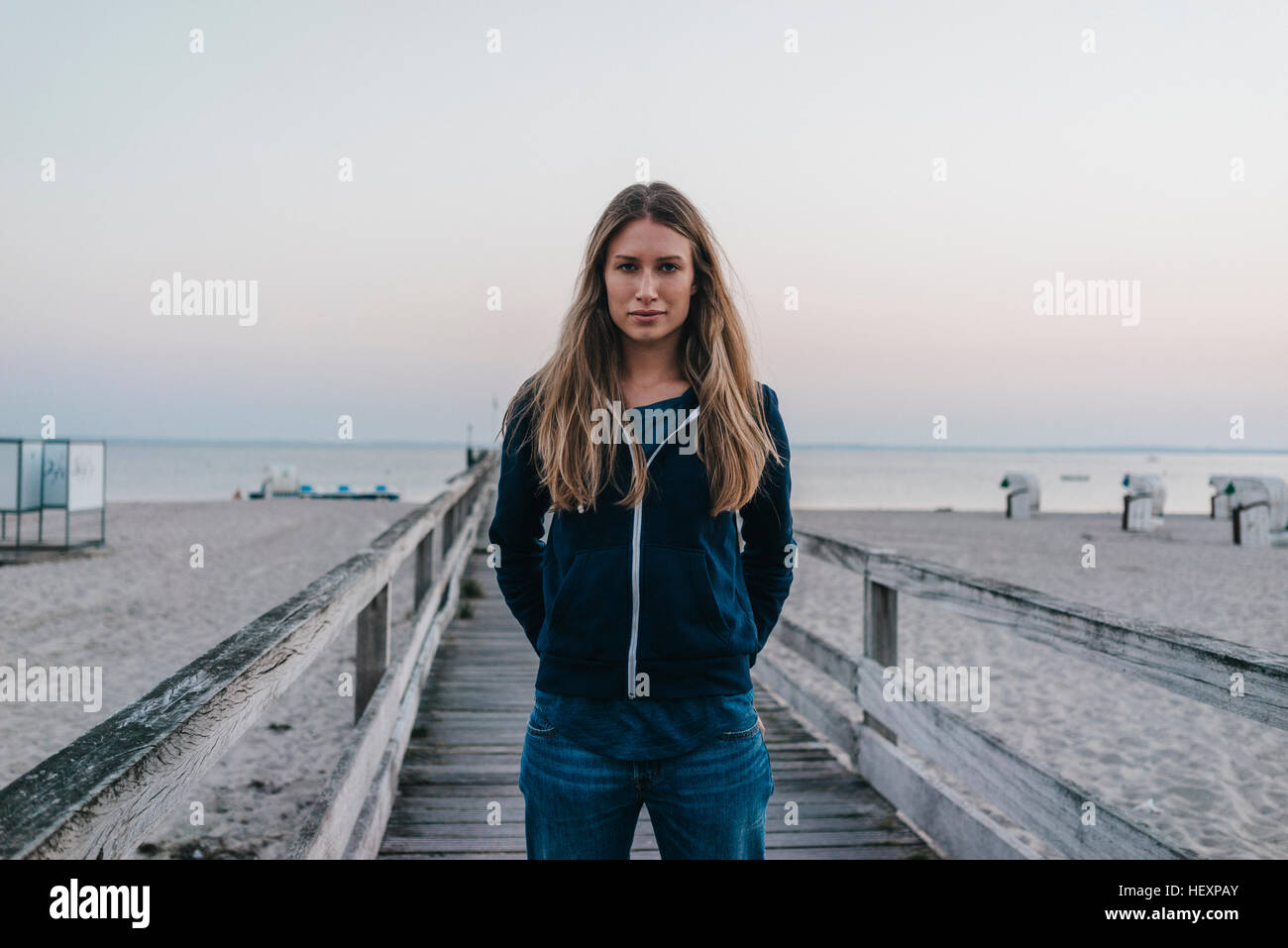 Woman on jetty baltic hi-res stock photography and images - Alamy