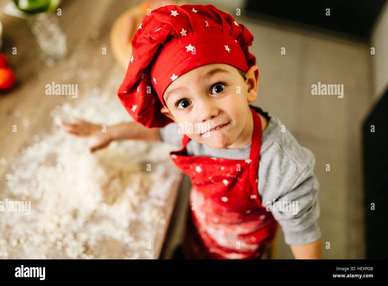 Portrait of little boy in kitchen Stock Photo - Alamy