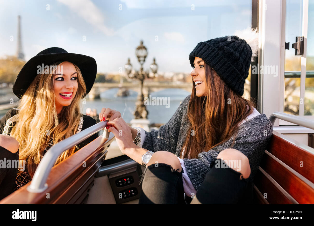 Two smiling women on a tour bus hi-res stock photography and images - Alamy