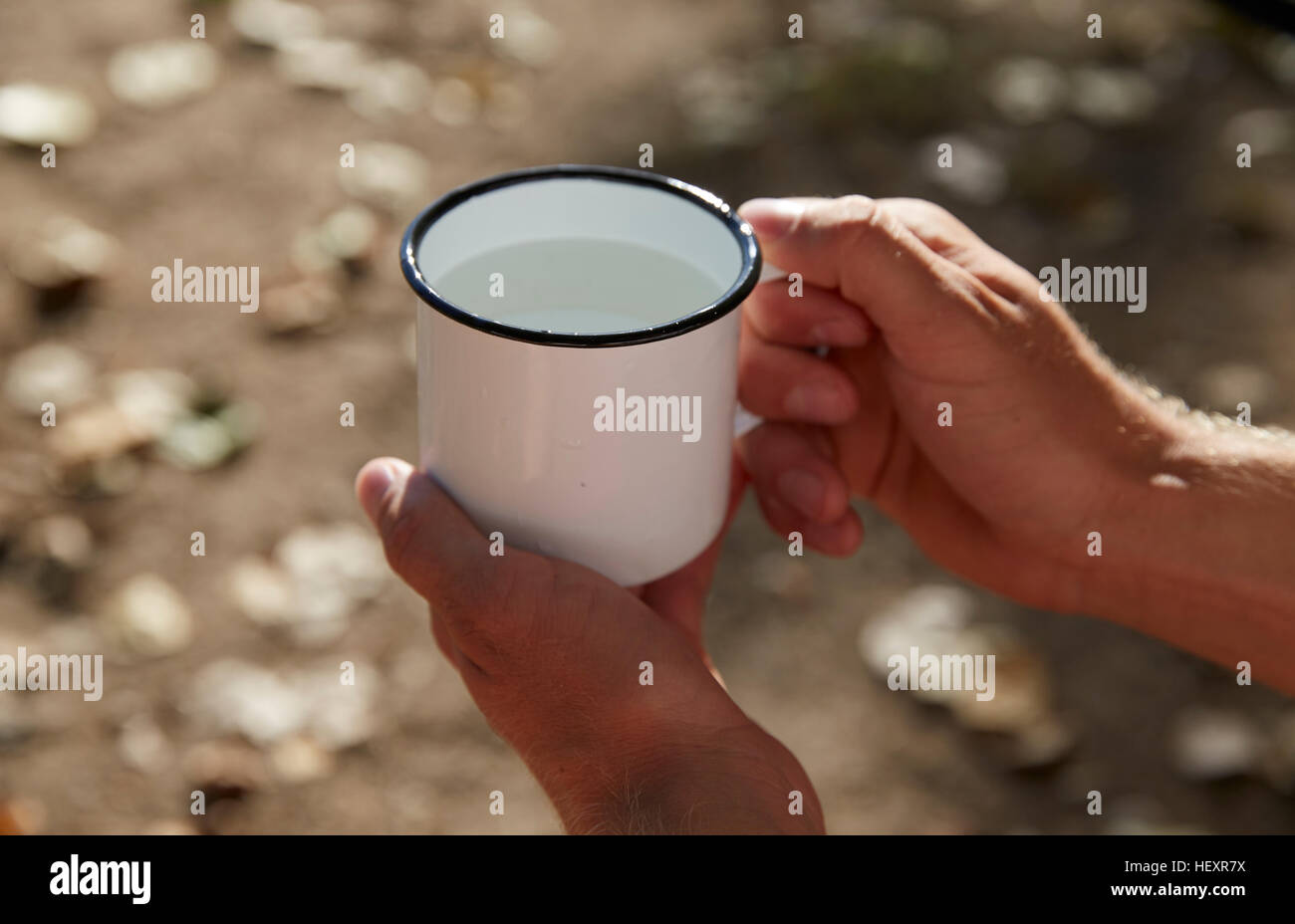 Hand water mug hi-res stock photography and images - Alamy