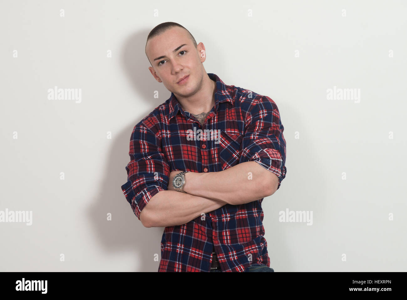 Portrait of Handsome Man With Crossed Hands Over Gray Background Stock ...