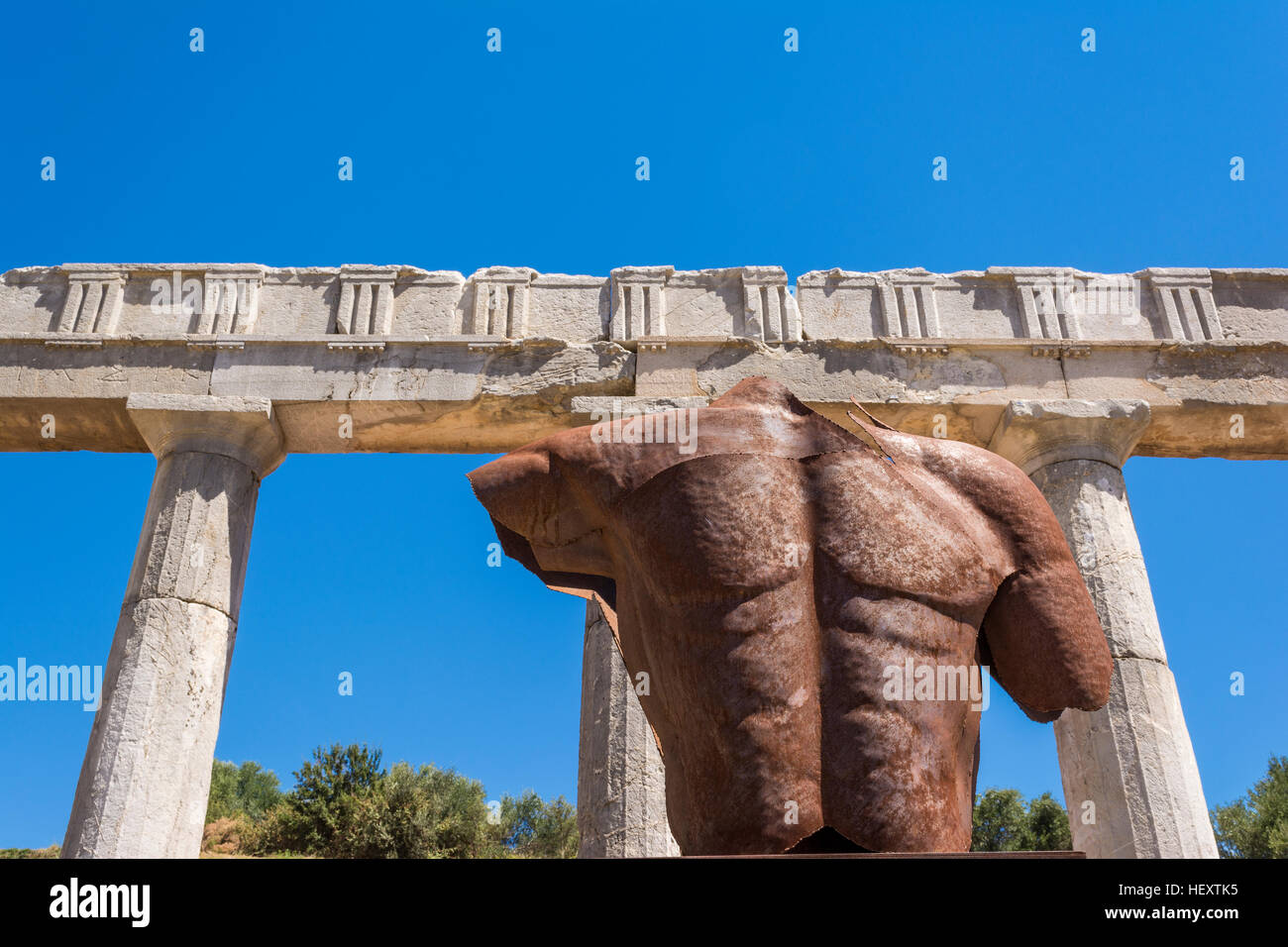 Metallic headless statue in the ancient Greek city of Messinia at ...