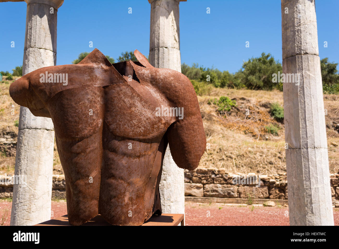 Metallic headless statue in the ancient Greek city of Messinia at ...