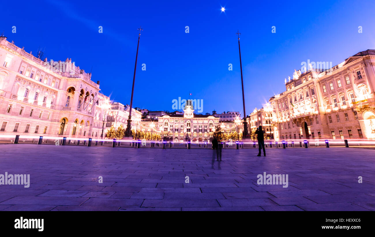 the beautiful square of Trieste with Christmas trees Stock Photo - Alamy