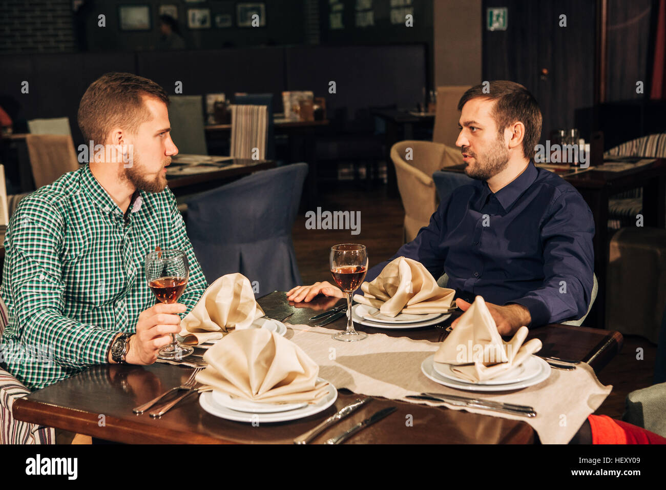 two men on a business dinner, drink wine Stock Photo - Alamy