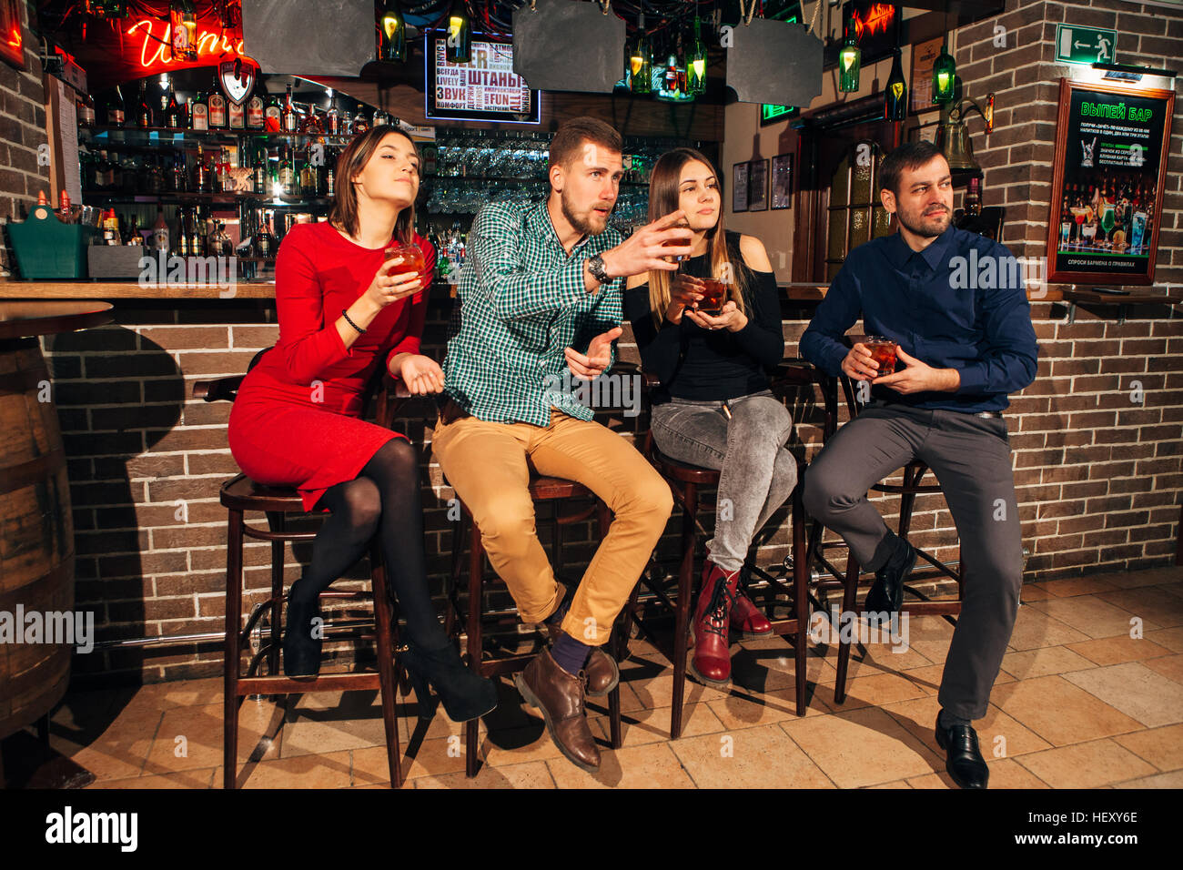 Group friends enjoying drink bar hi-res stock photography and images ...