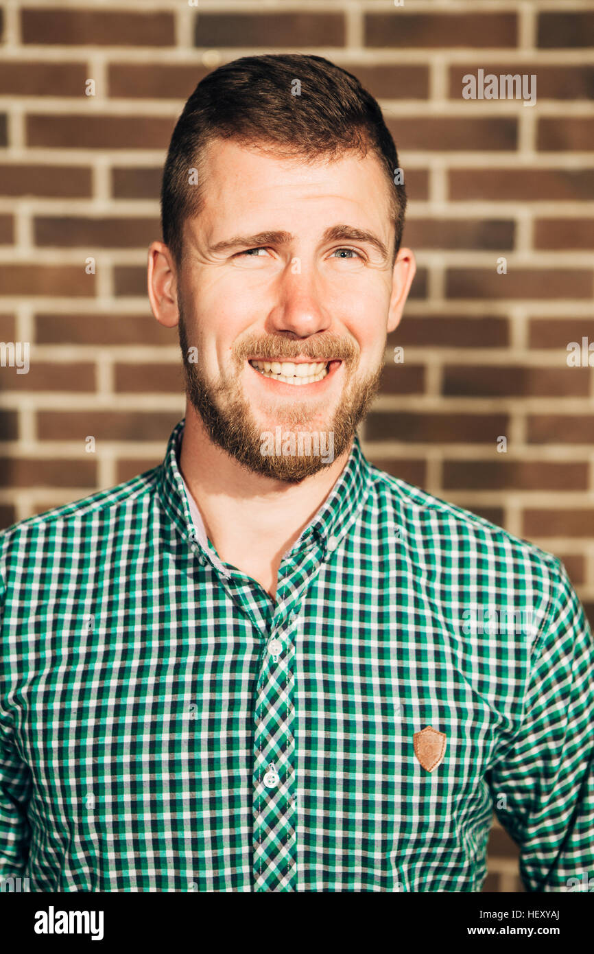 the man smiles at the camera Stock Photo - Alamy