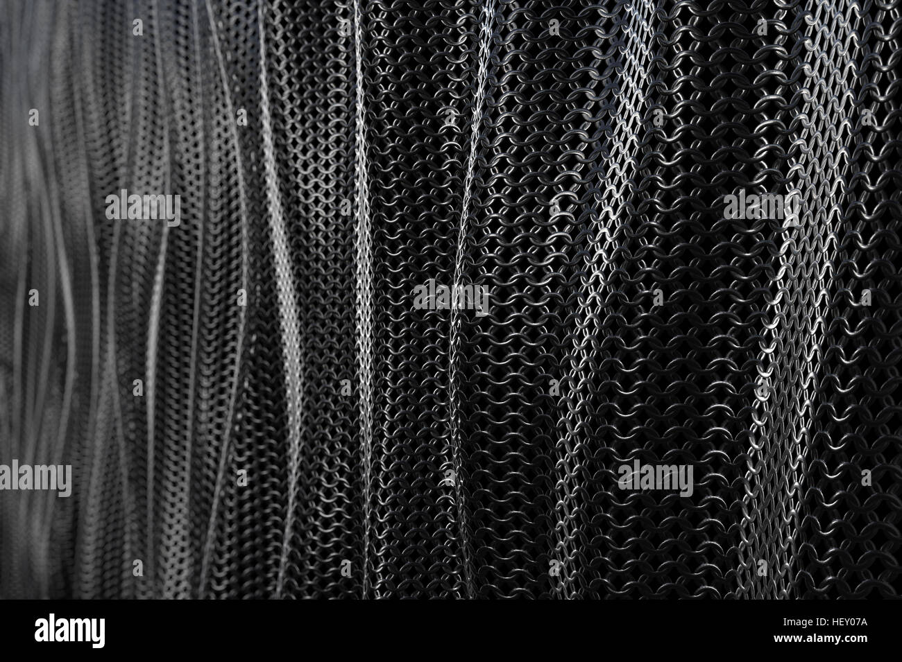 Dark metallic chain armor abstract soft background Stock Photo - Alamy