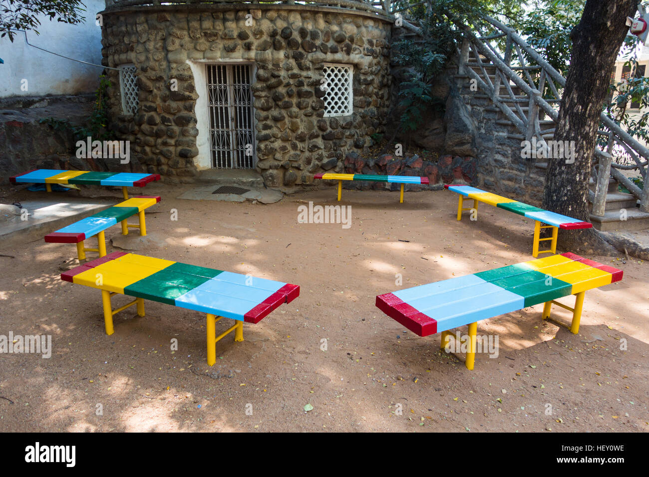 Multi-Colored metal bench in a school in Hyderabad,India Stock Photo ...