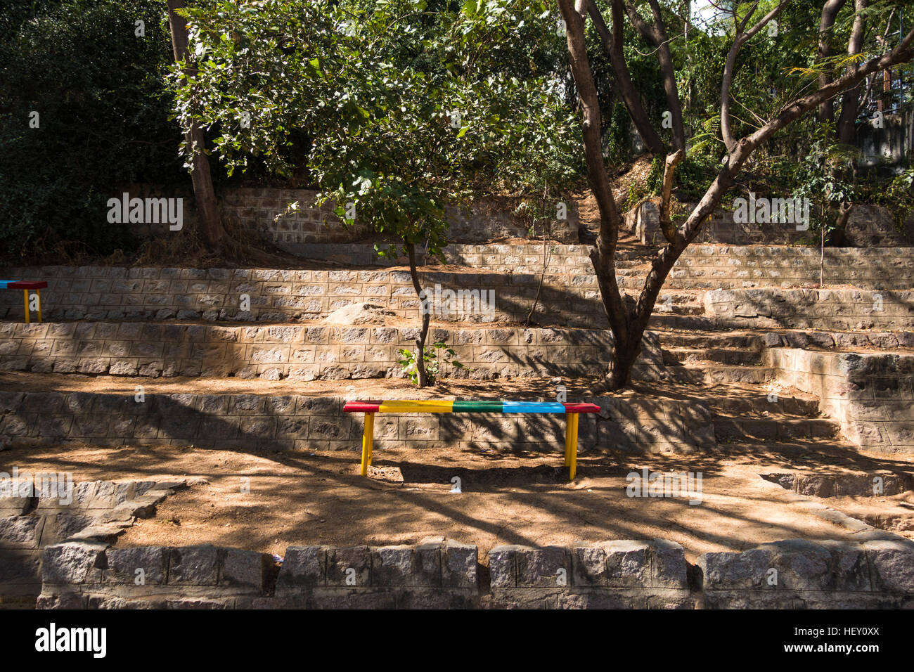 Multi-Colored metal bench in a school in Hyderabad,India Stock Photo ...