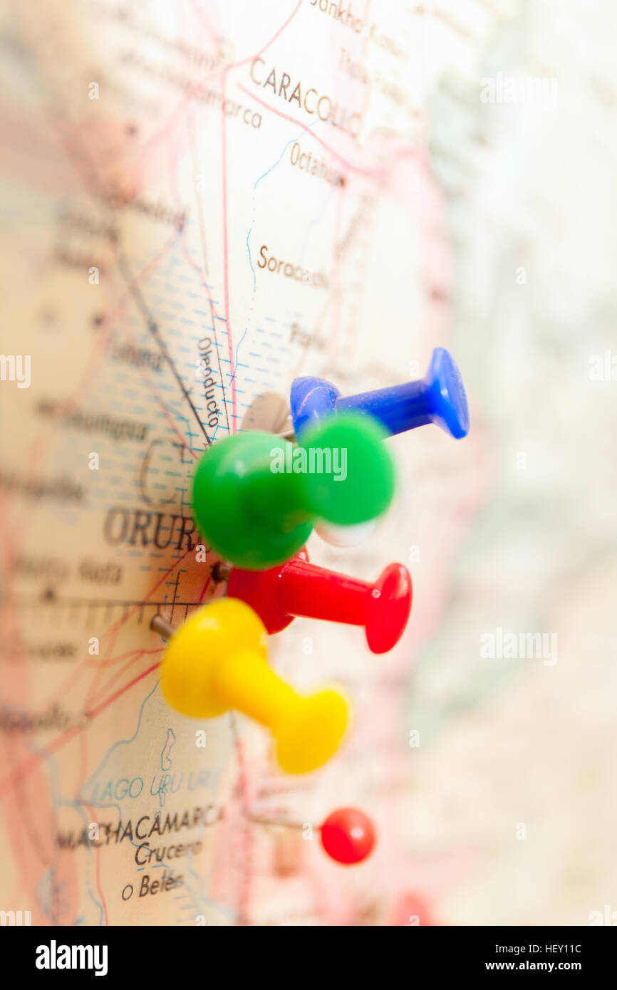 Travel destination points on a map indicated with colorful thumbtacks ...