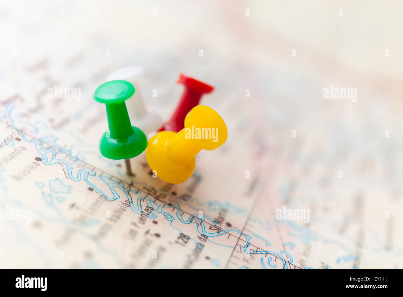 Travel destination points on a map indicated with colorful thumbtacks ...