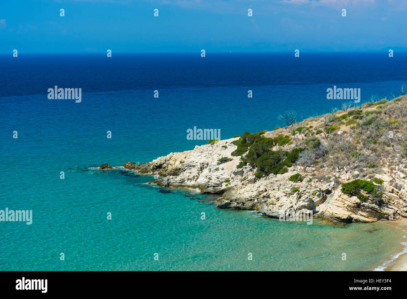 Isolated rock in the sea, on the beaches of Greece and Sicily Stock ...