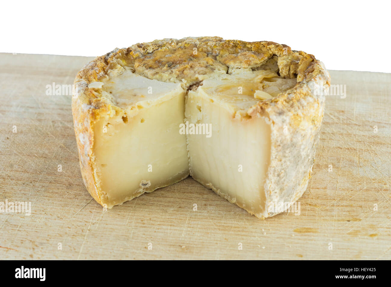 The form of hard cheese of a bloomy rind goat's milk, frost crust ...