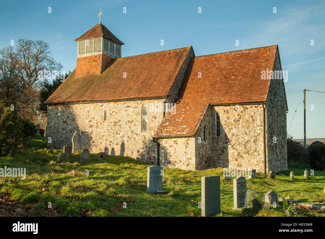 Winter afternoon at St Agatha church in Coates, West Sussex, England ...
