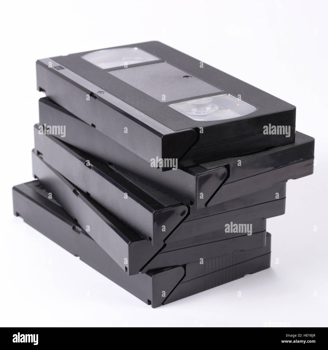 Pile of vintage VHS videotapes on a white background Stock Photo - Alamy