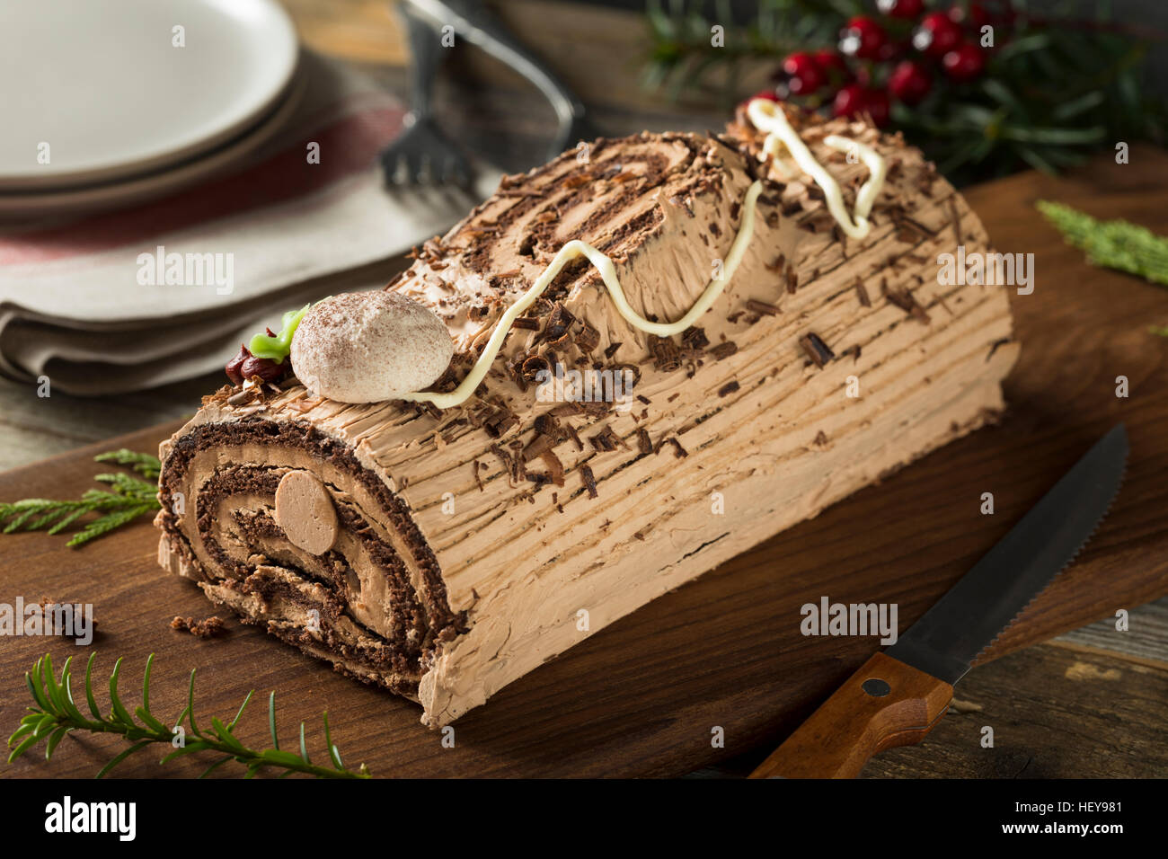 Homemade Chocolate Christmas Yule Log with Mousse and Frosting Stock ...