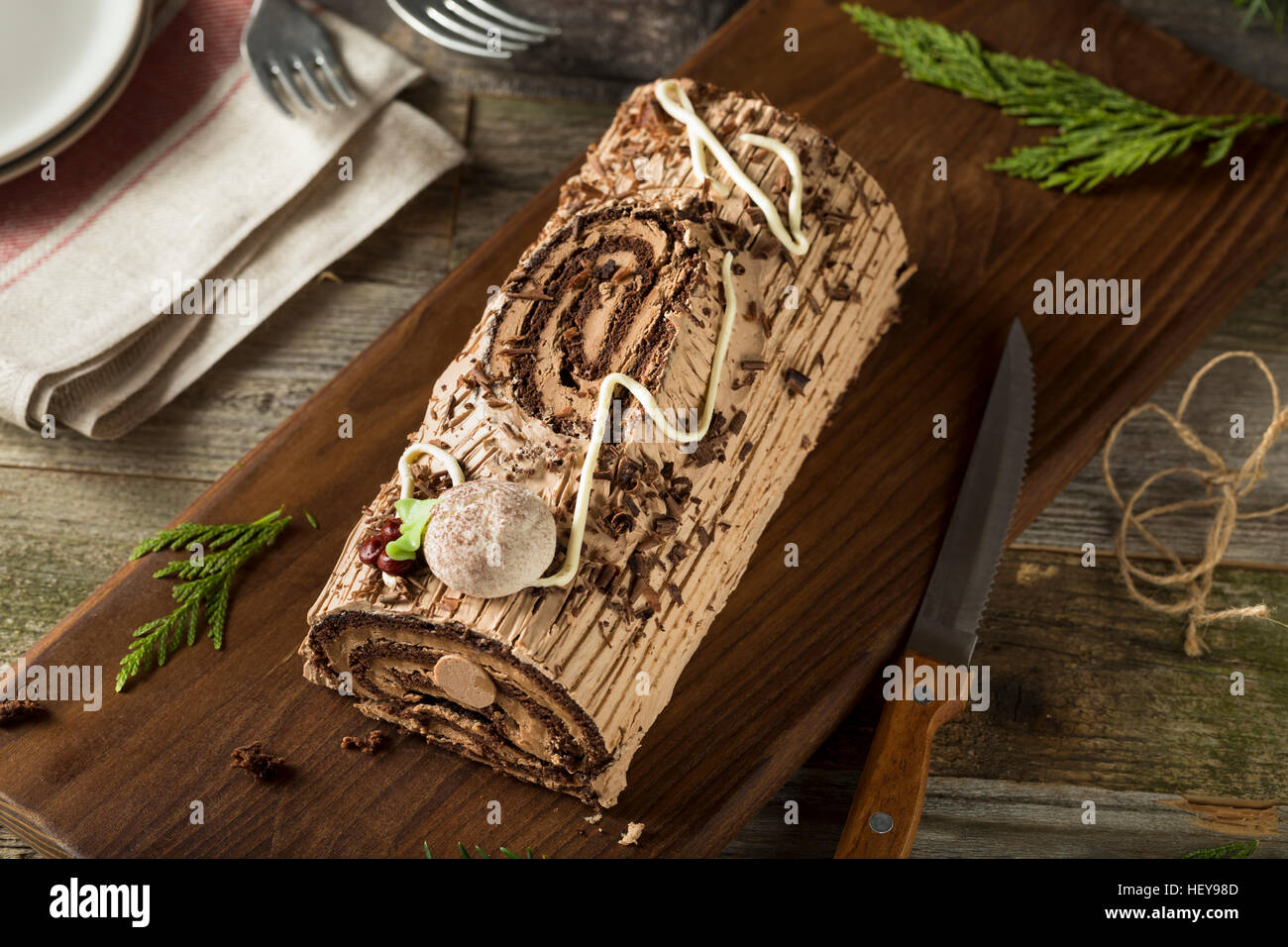 Homemade Chocolate Christmas Yule Log with Mousse and Frosting Stock ...