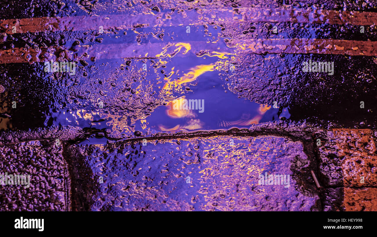 Close shot of a water puddle Stock Photo - Alamy