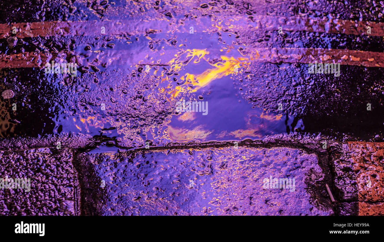 Close shot of a water puddle Stock Photo - Alamy