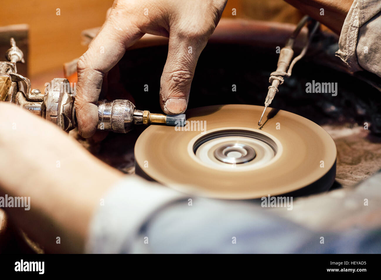 Hand polishing gold jewelry ring hi-res stock photography and images ...