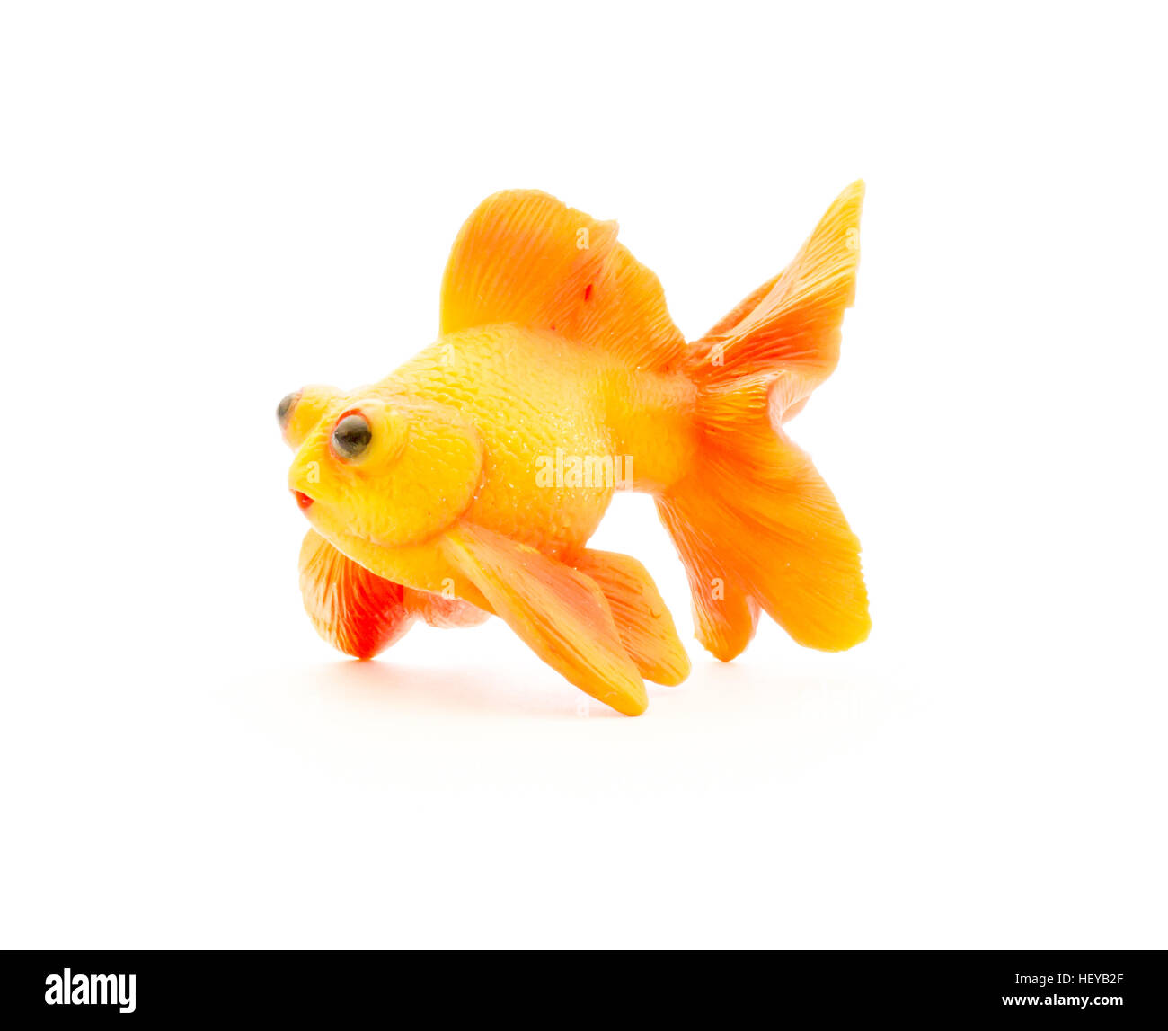 The Miniature toy gold fish Stock Photo - Alamy