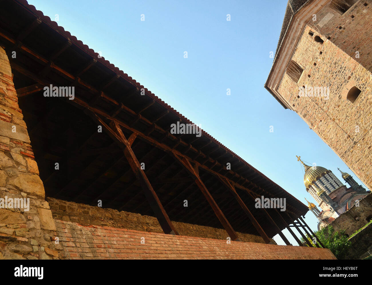 old and newer structures and architecture in romania with a stone tower ...
