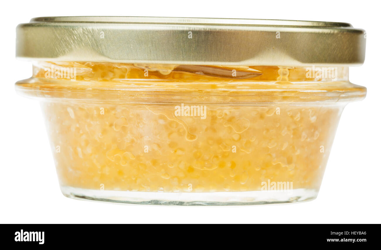 side view of closed glass jar with yellow caviar of pike fish isolated ...
