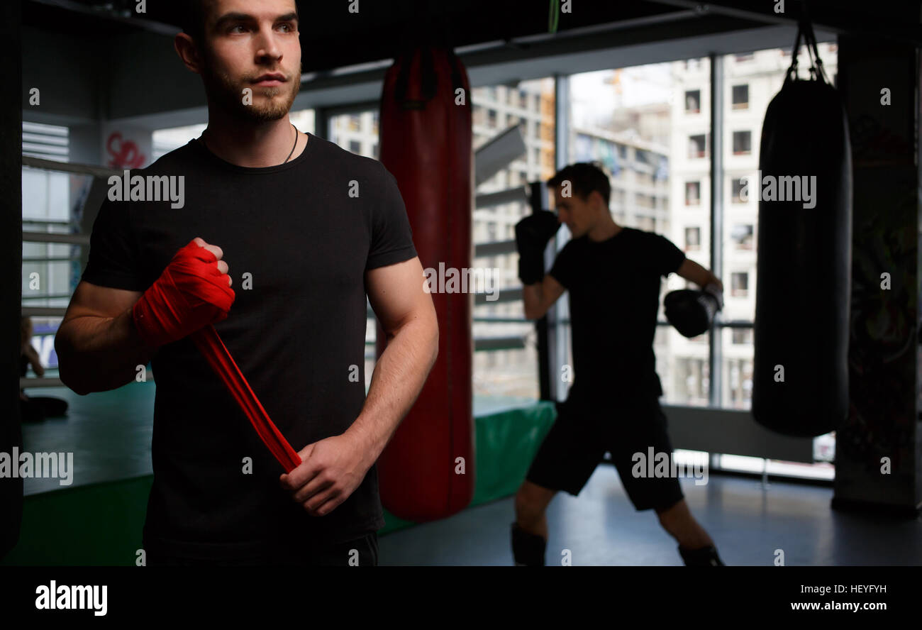Young man engaged in boxing Stock Photo - Alamy