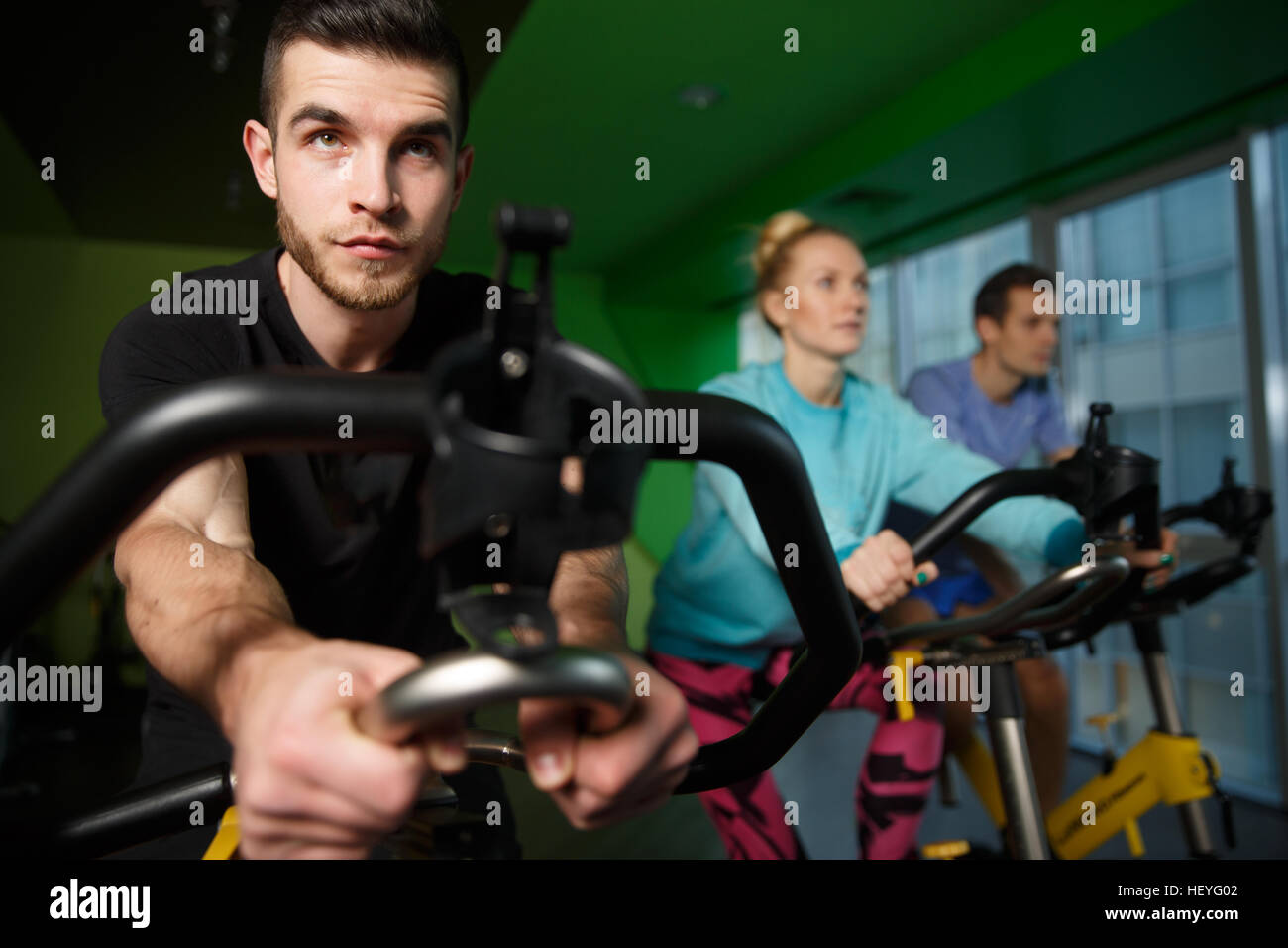 Young people practiced on simulators Stock Photo - Alamy