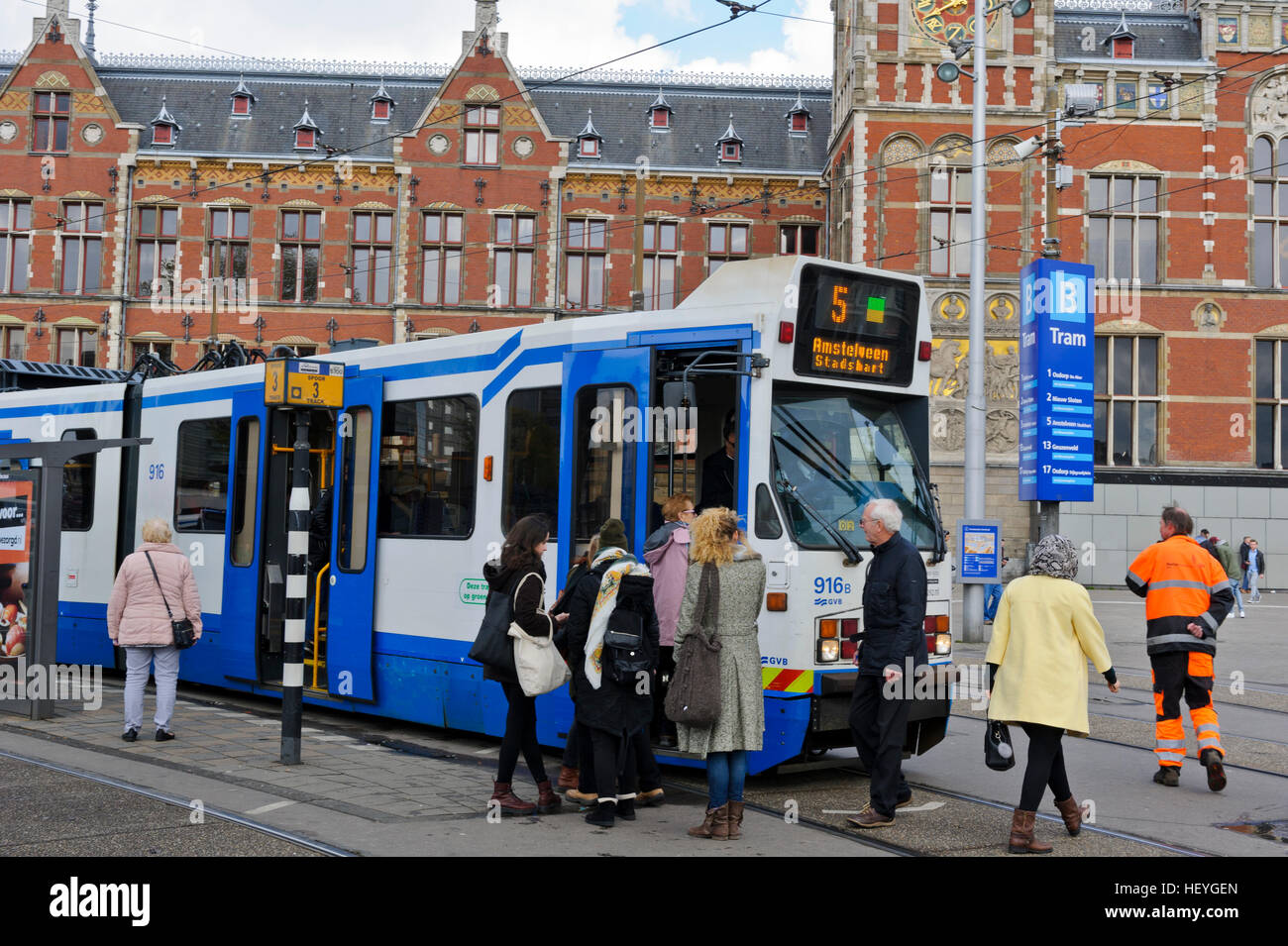 A tram outside the Amsterdam central Station, Holland, Netherlands ...