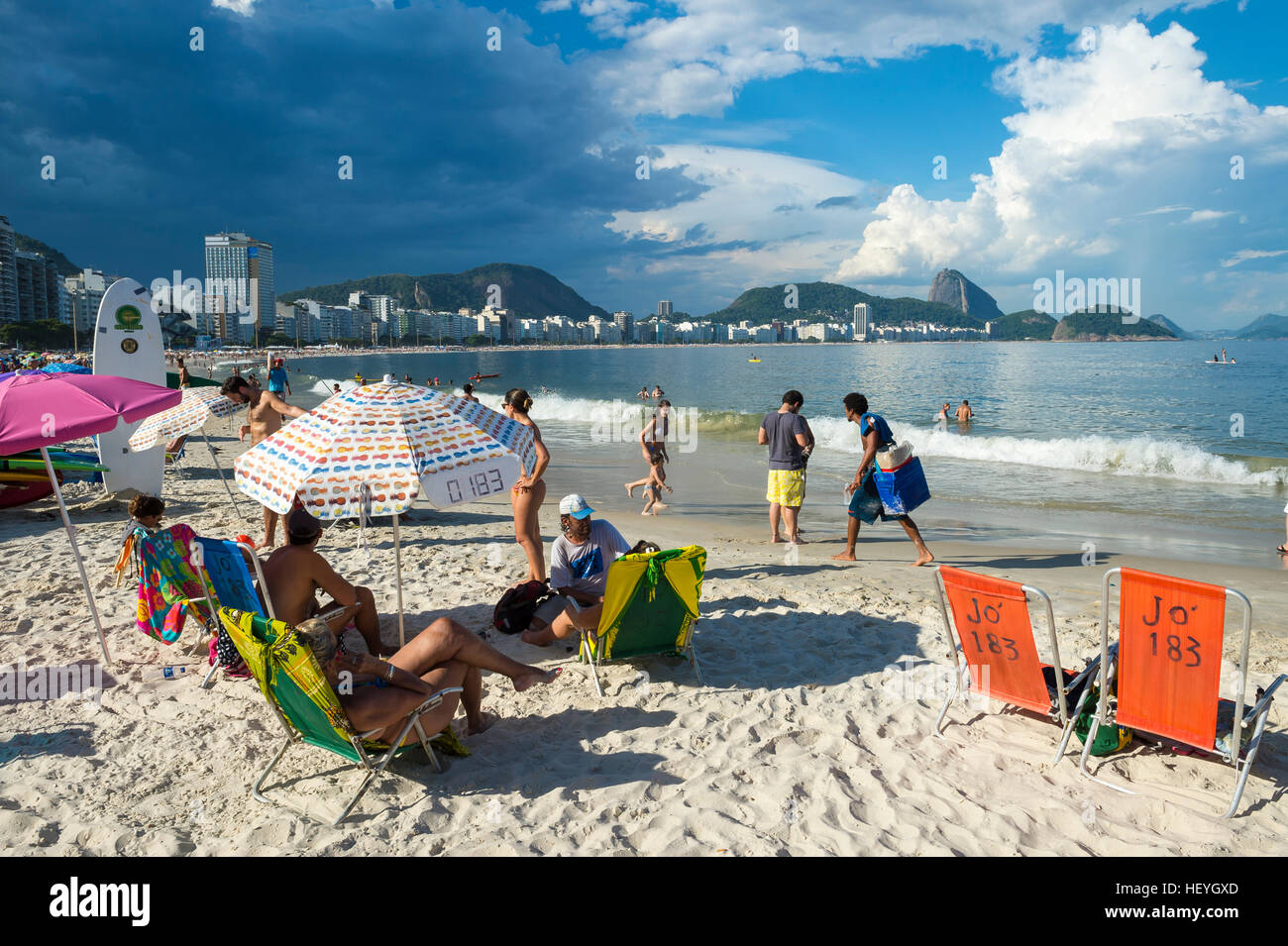Sunbathing on copacabana beach hi-res stock photography and images - Alamy