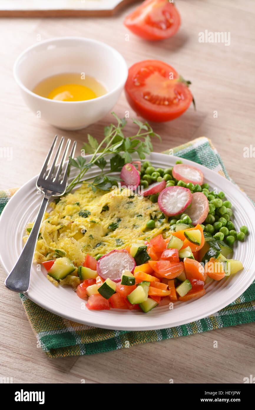 egg omelet and side dish assorted vegetables Stock Photo - Alamy