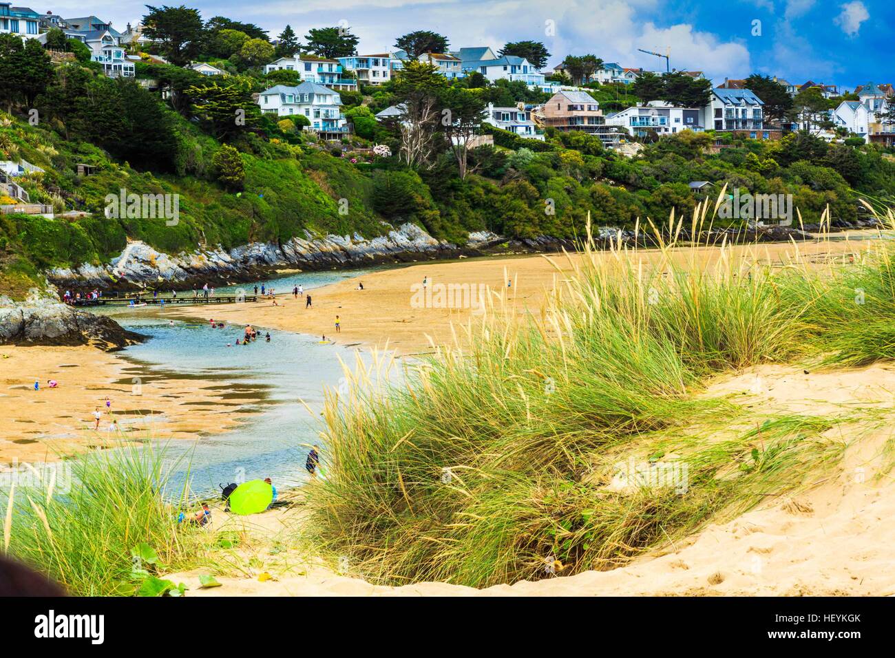 A views across the sand dunes at Crantock Beach and the Gannel River ...