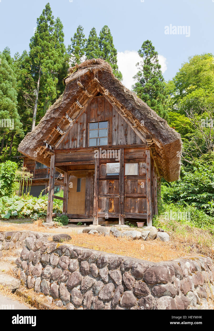 Old house of unique gassho style with thatched roof in Ogimachi village ...