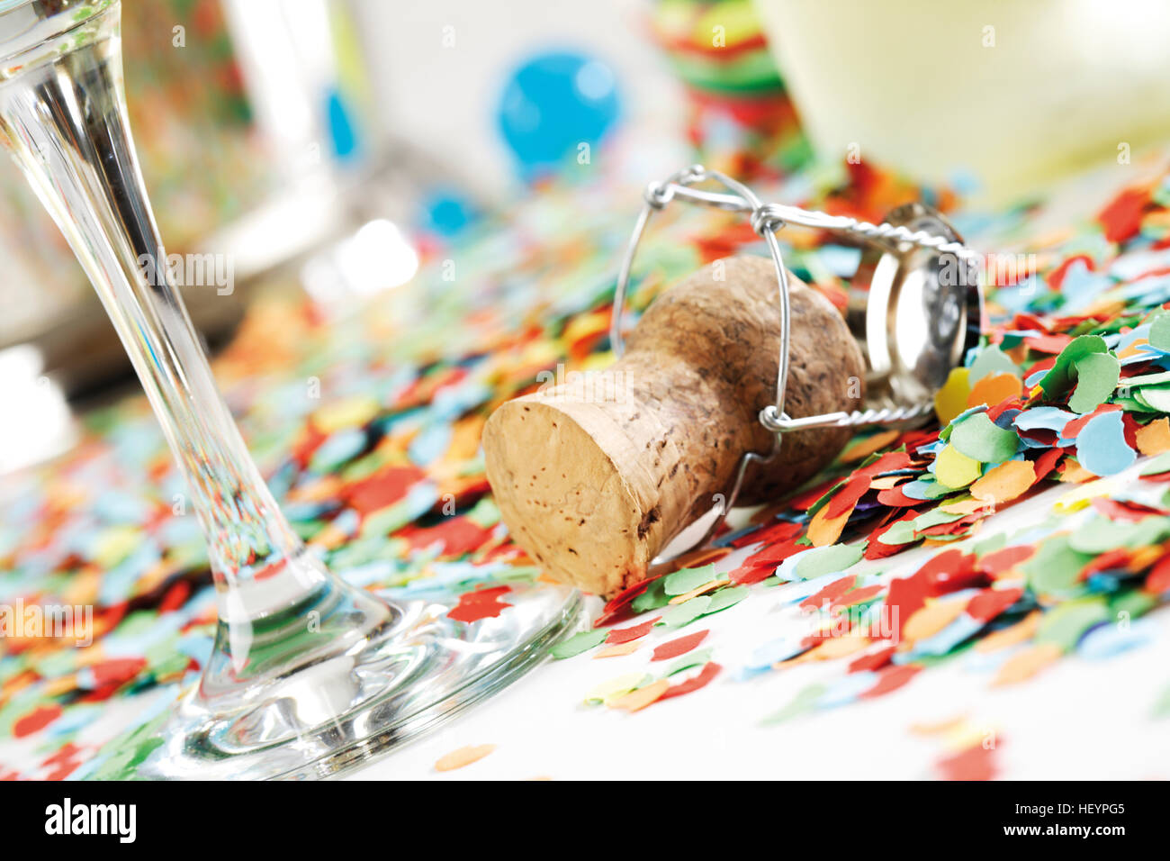Champagne cork on confetti Stock Photo - Alamy