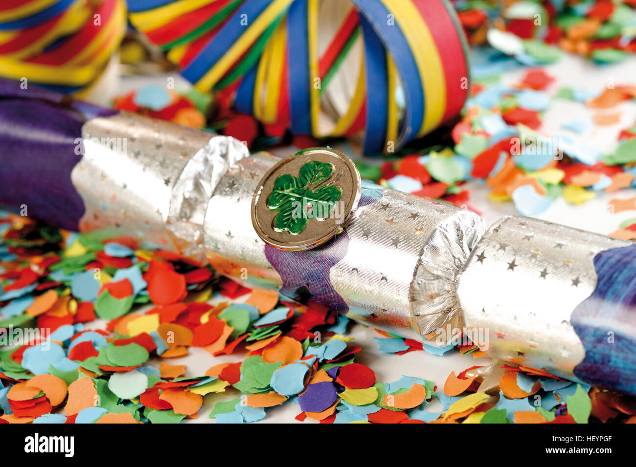 Firecracker with four-leaf clover as a lucky charm Stock Photo - Alamy