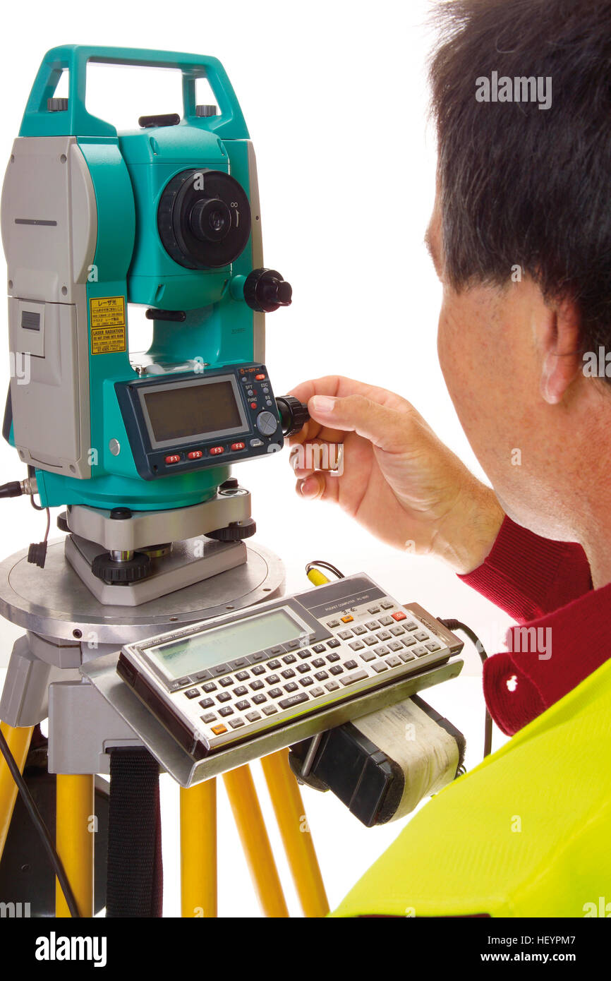 Land surveyor and measuring device on a tripod Stock Photo - Alamy