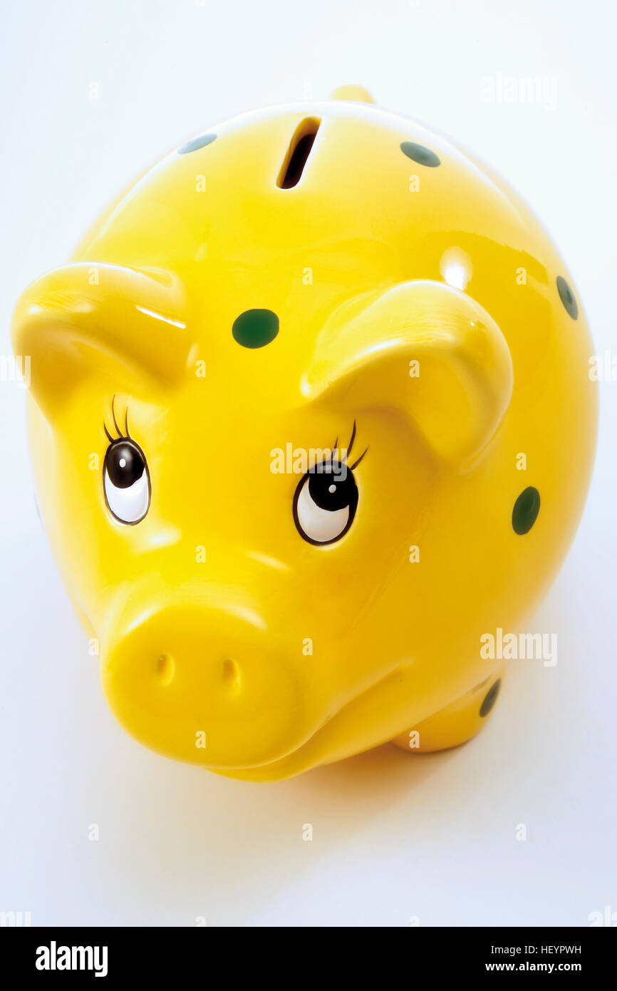 Yellow piggy bank Stock Photo - Alamy